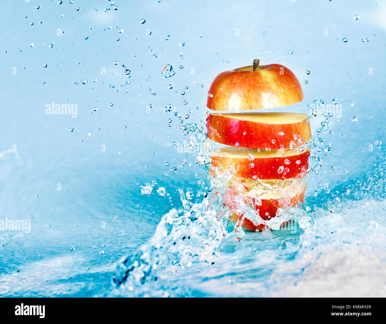 fresh water splash on red apple Stock Photo - Alamy