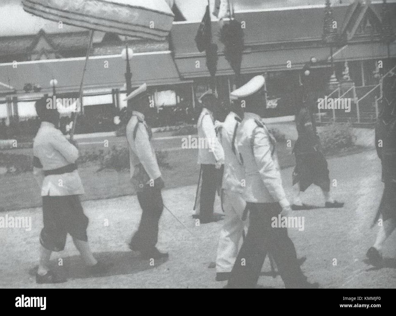 King Rama IX of Thailand is seen performing a ritual of ...