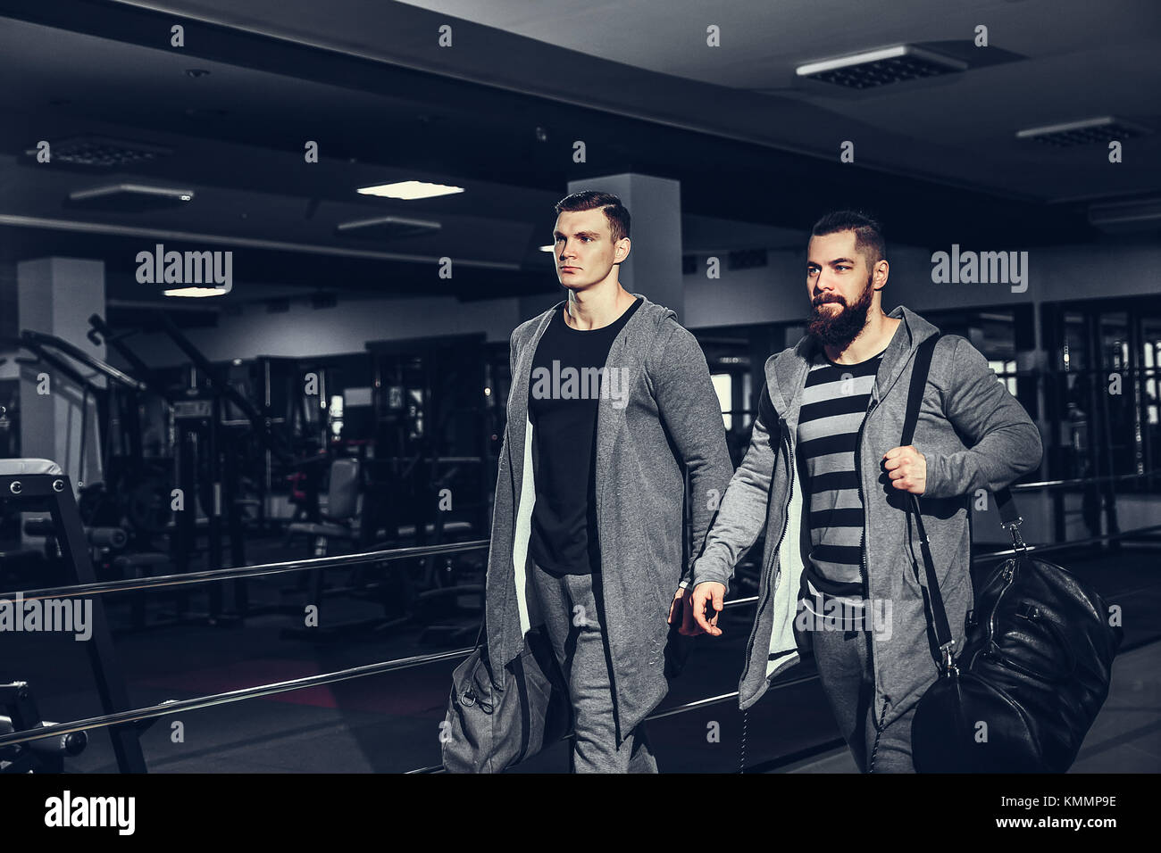 Confident young sportsmen leaving gym Stock Photo - Alamy