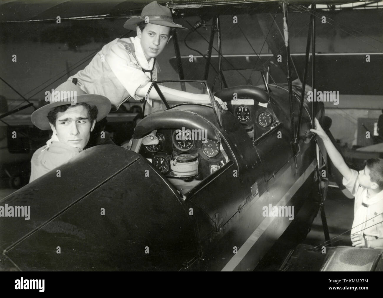 Boy Scouts playing with an aircraft, Italy 1930s Stock Photo - Alamy