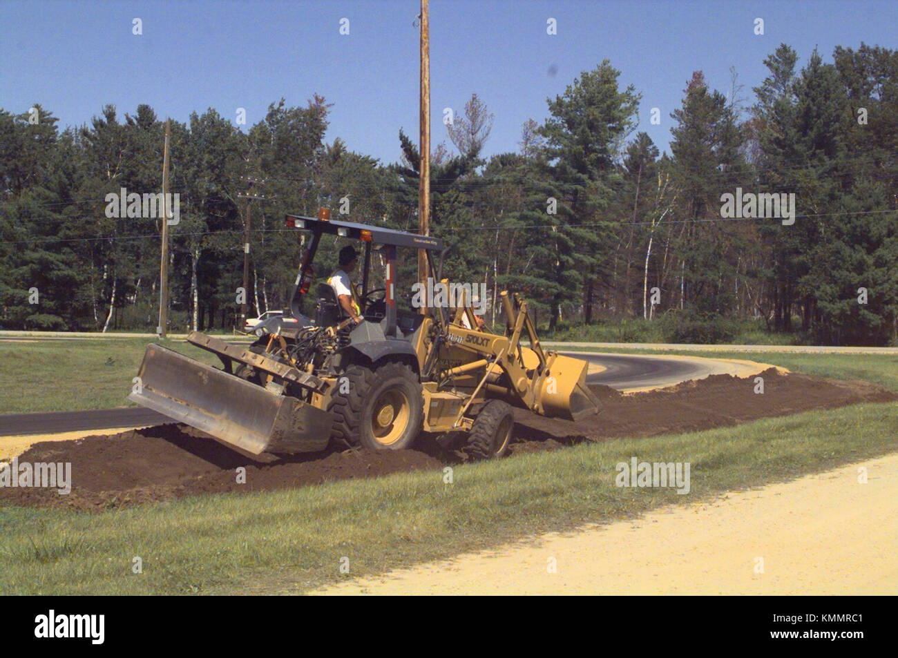 Workers with Mathy Construction of Onalaska work on the running track ...