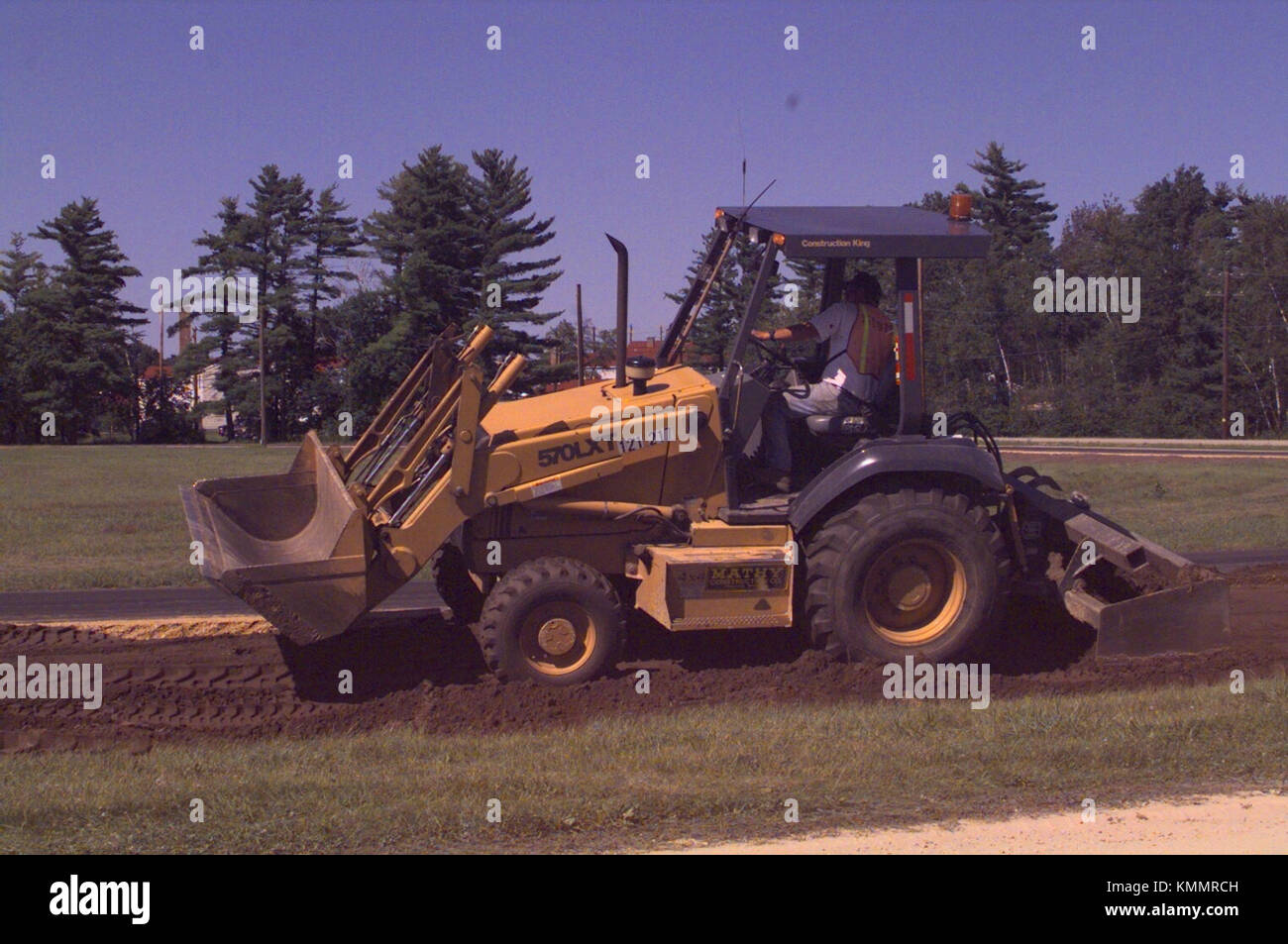 Workers with Mathy Construction of Onalaska work on the running track ...
