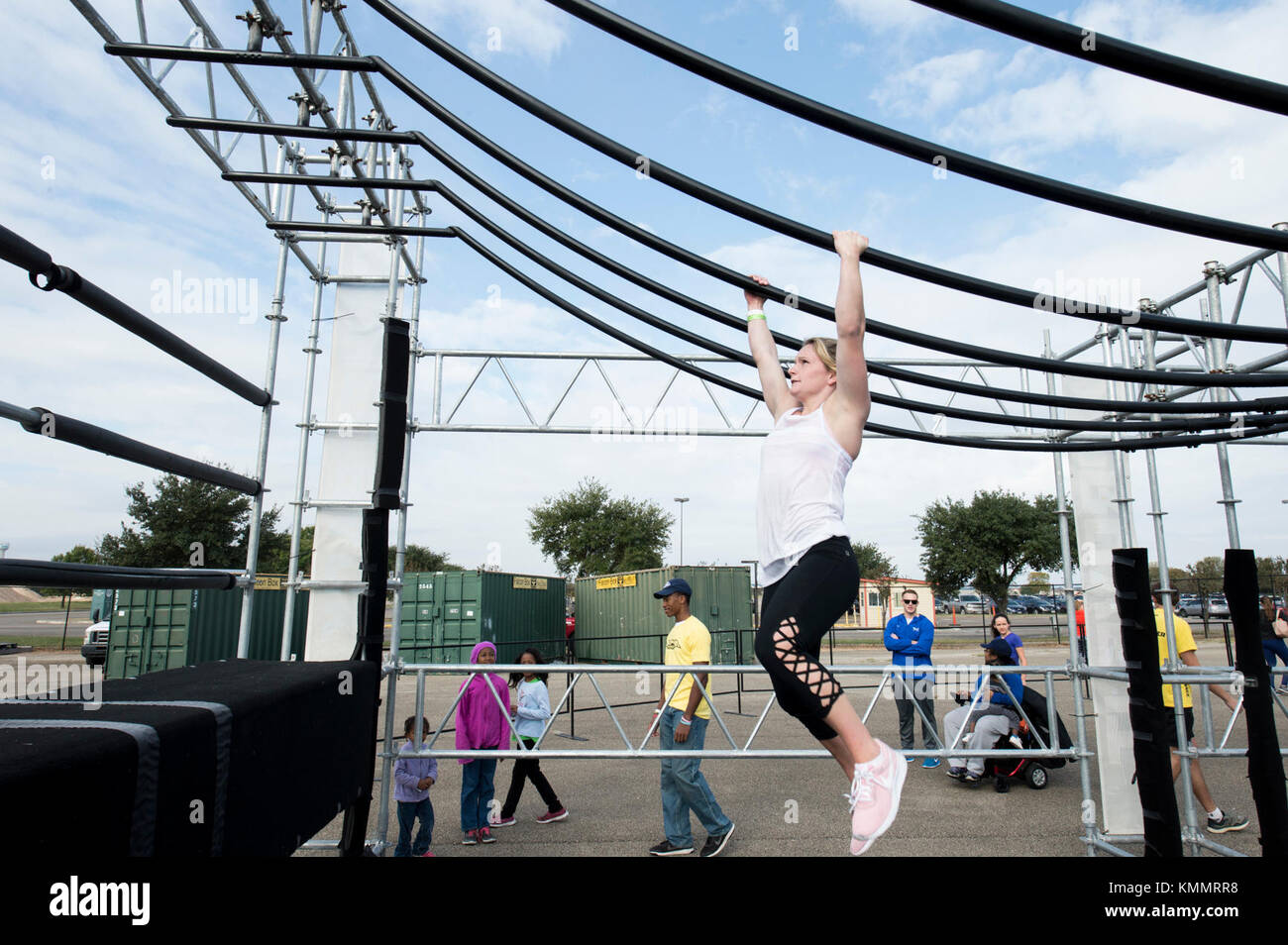 A top female Air Force Alpha Warrior athlete competes on a 32-obstacle ...