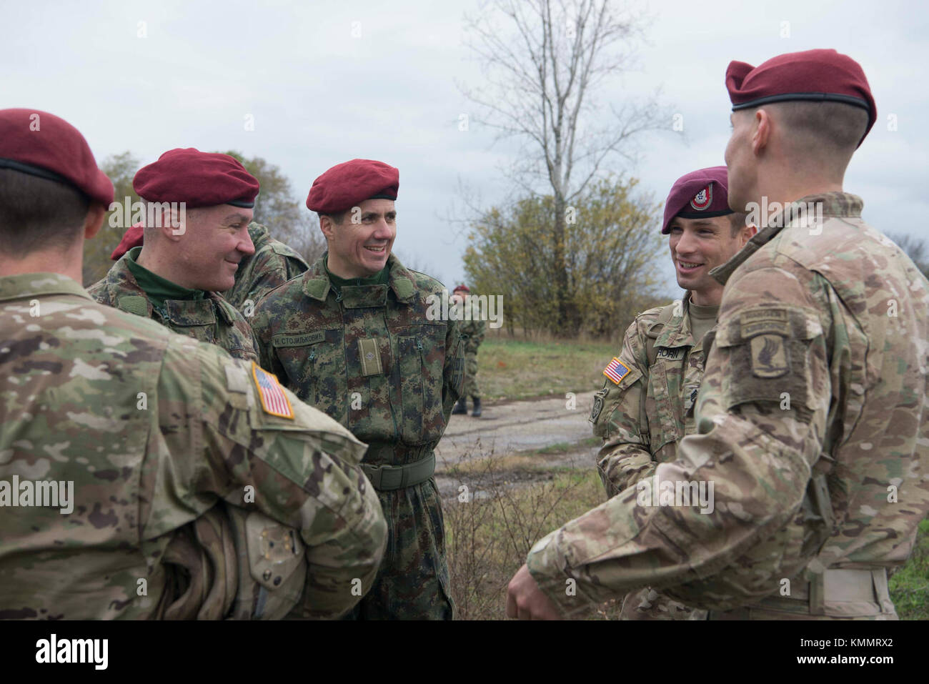 U.S. paratroopers and Serbian armed forces discuss their jump after ...