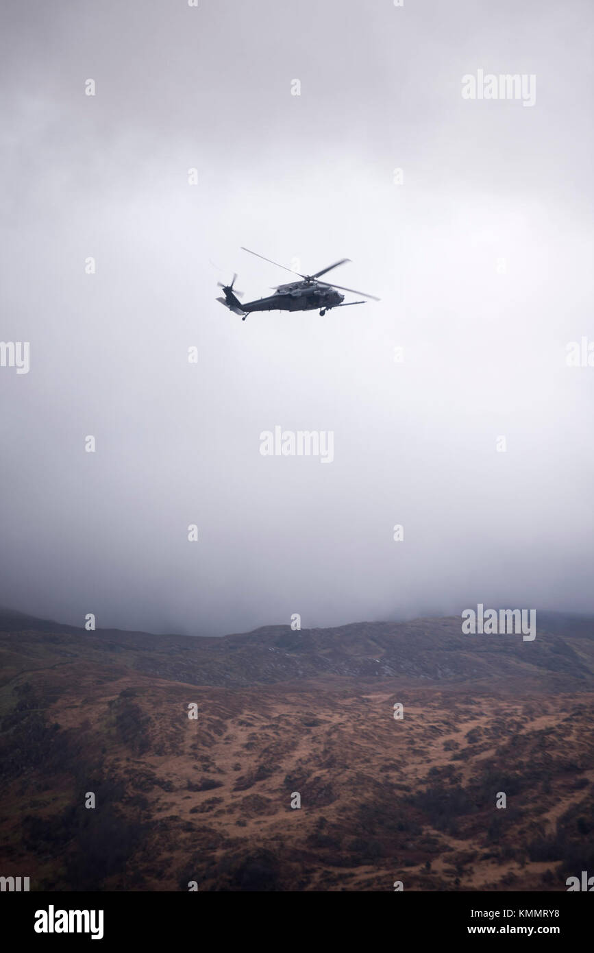 An HH-60G Pave Hawk from the 56th Rescue Squadron flies above Wales Nov ...