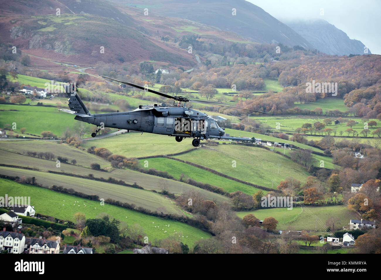 An HH-60G Pave Hawk from the 56th Rescue Squadron flies above Wales Nov ...