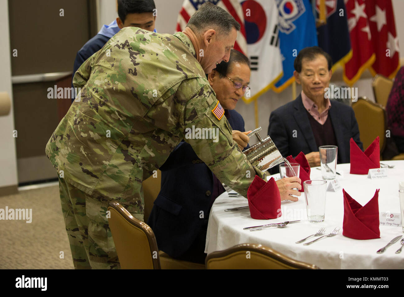 U.S. Army Lt. Gen. Thomas Vandal, 8th Army commanding general, pours a ...