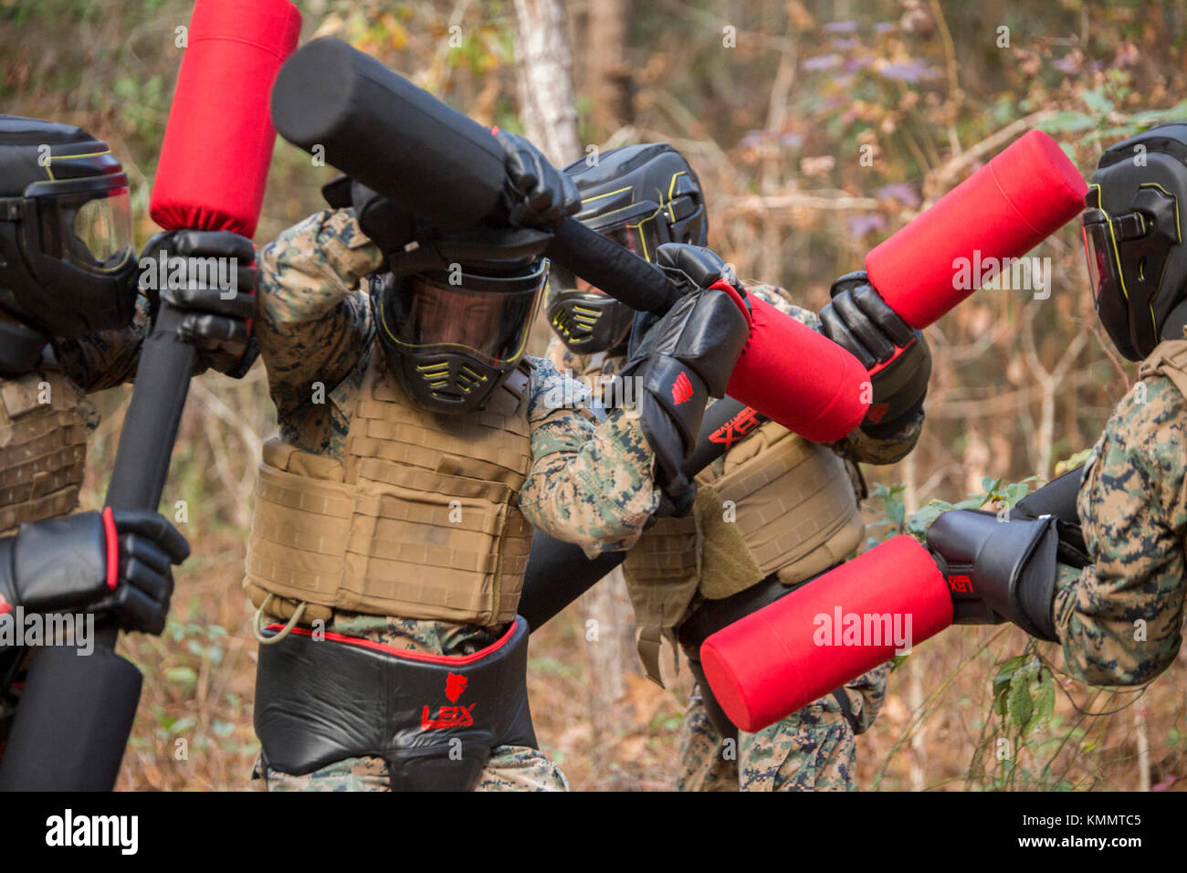 Marines practice parrying and engaging the enemy with pugil sticks ...