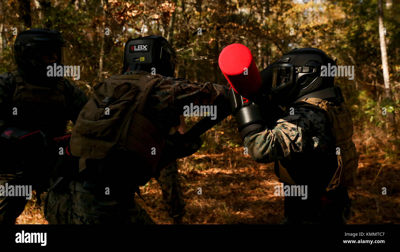 Marines fight each other in a pugil stick bout during a Marine Corps Martial Arts Instructors ...