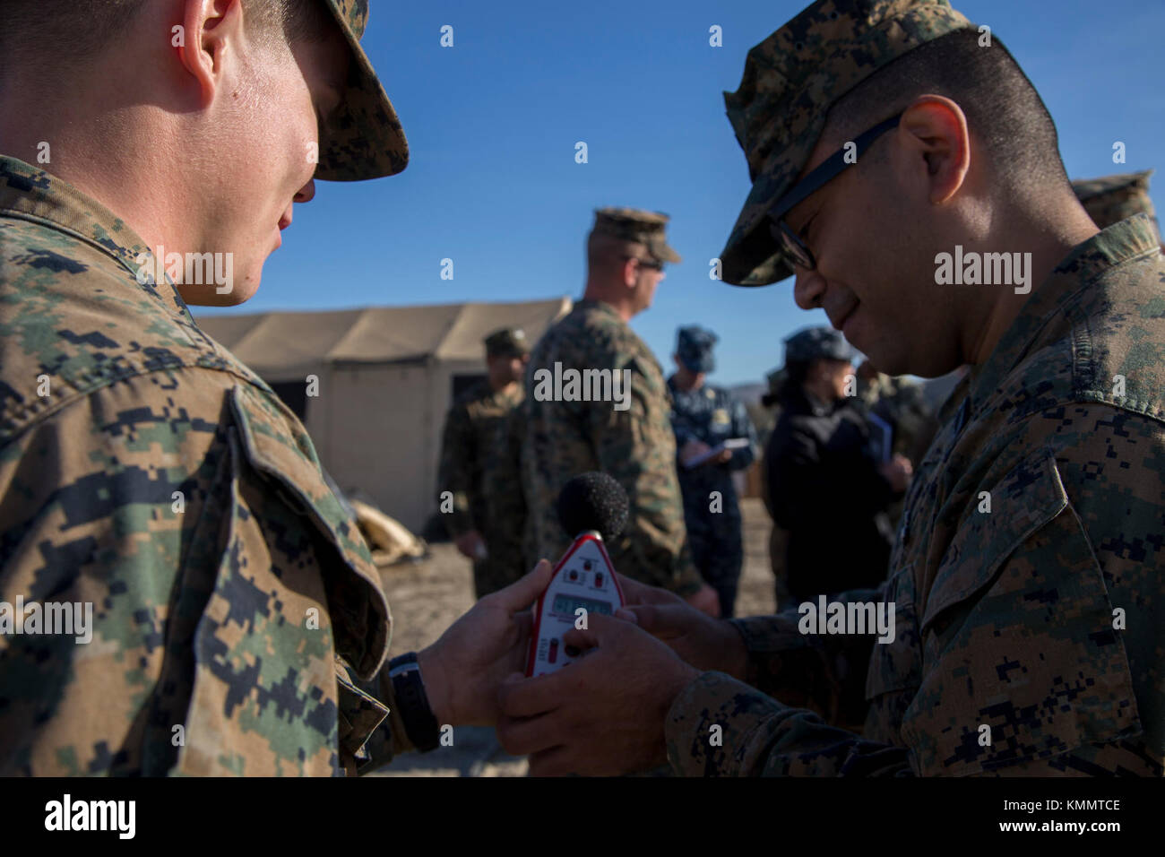 U.S. Navy Hospital Corpsman 1st Class Edgar Guirola, right, a ...