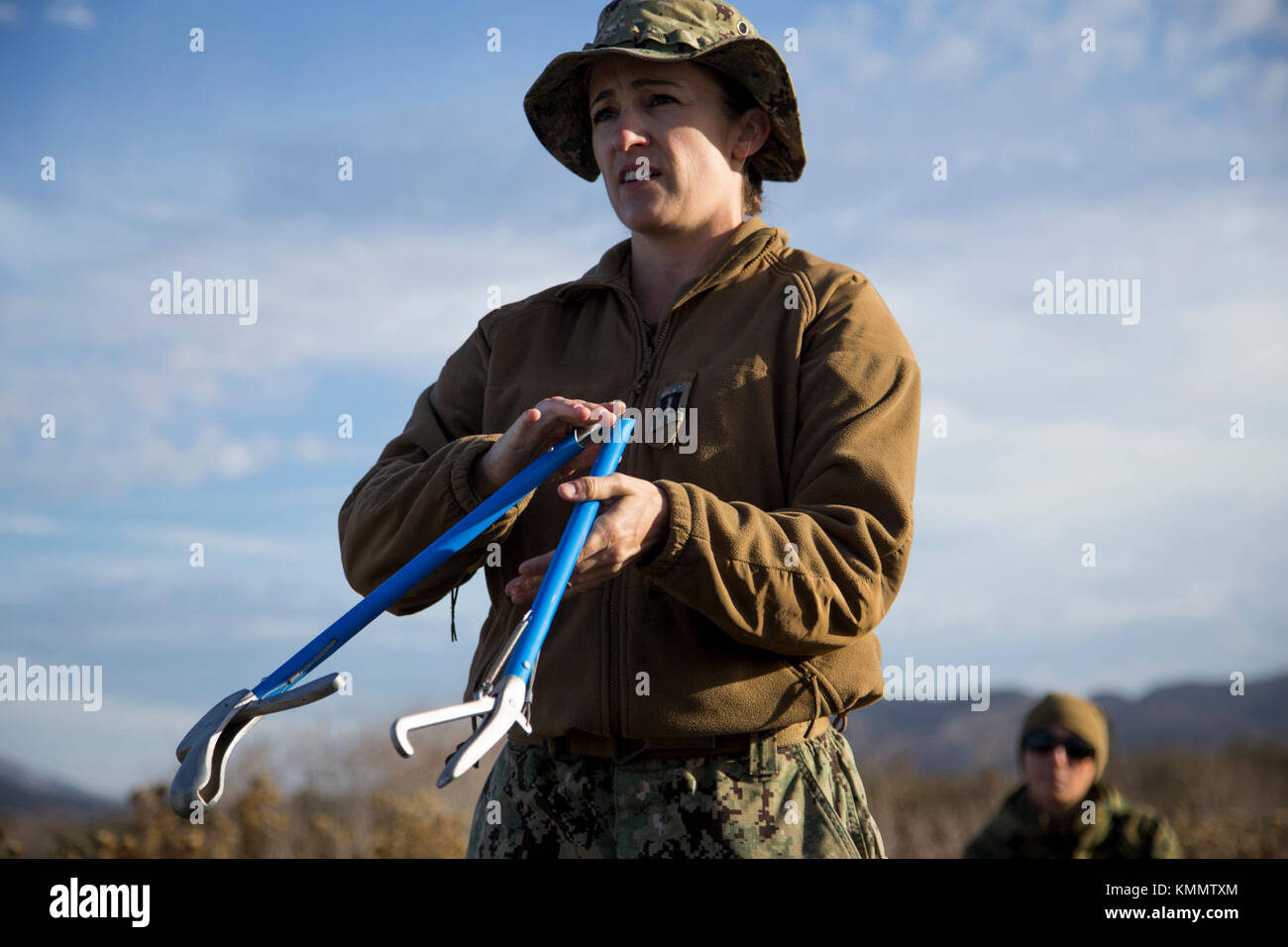 U.S. Navy Lt. Jennifer Knapp, an entomologist with Navy Environmental ...