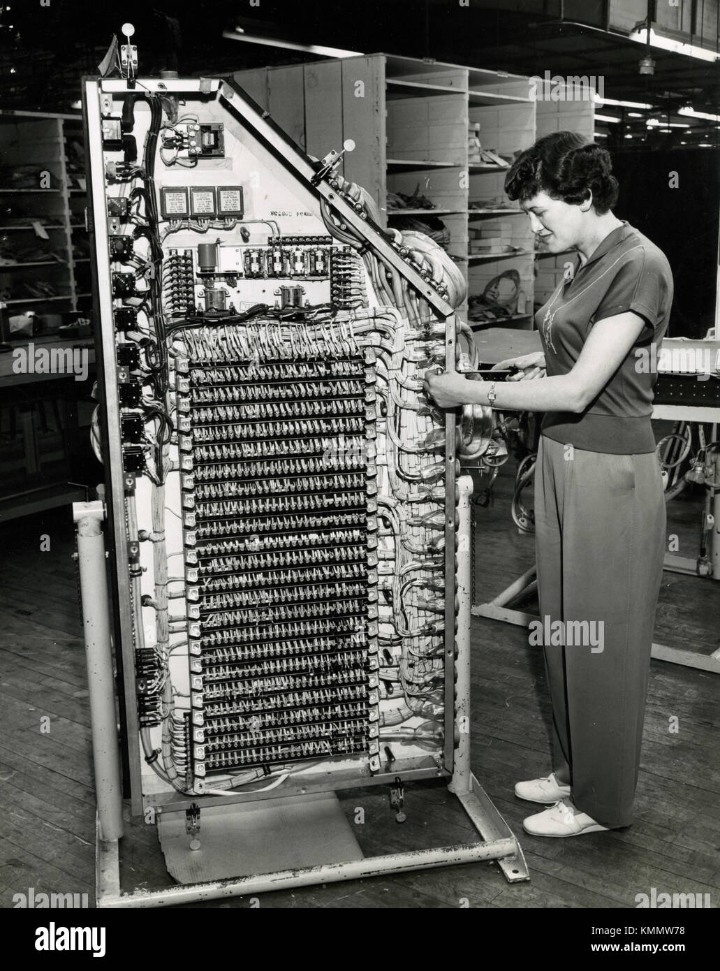 Woman assembling an aircraft engine, USA 1940s Stock Photo - Alamy