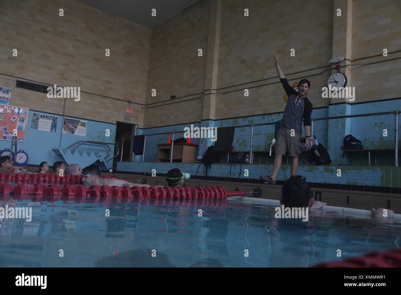 Swim coach Bobby Brewer teaches the Army athletes techniques for the ...