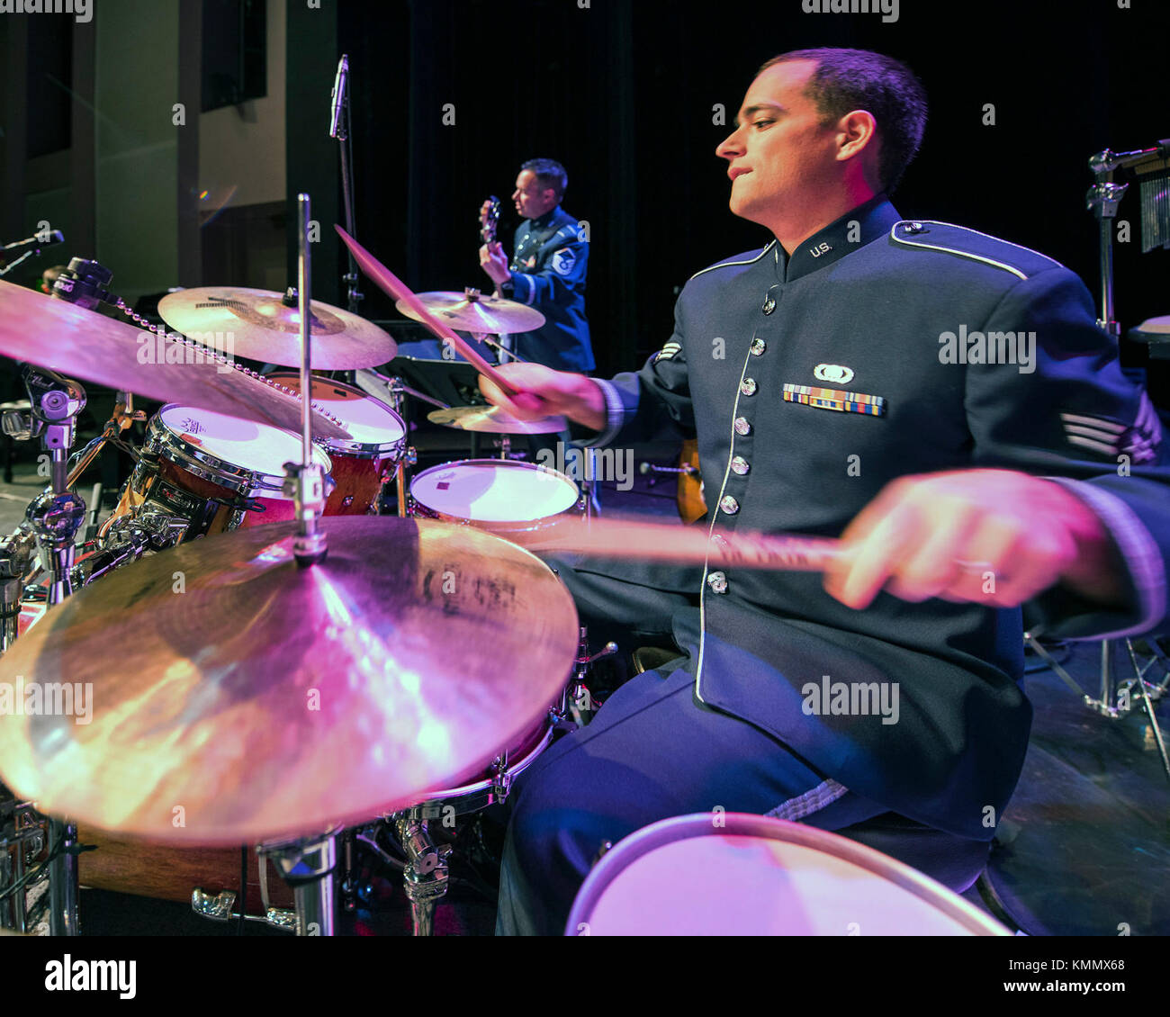 U.S. Air Force Senior Airman Joe Ganzelli, a drummer with the ...
