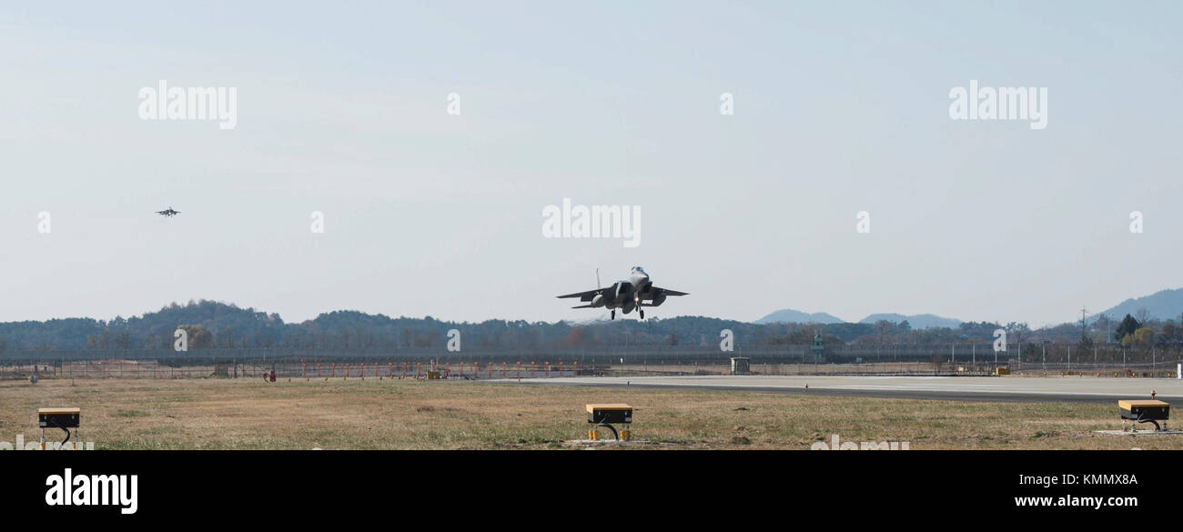 A F-15 from Kadena Air Base, Japan, comes in for landing at Gwangju Air ...