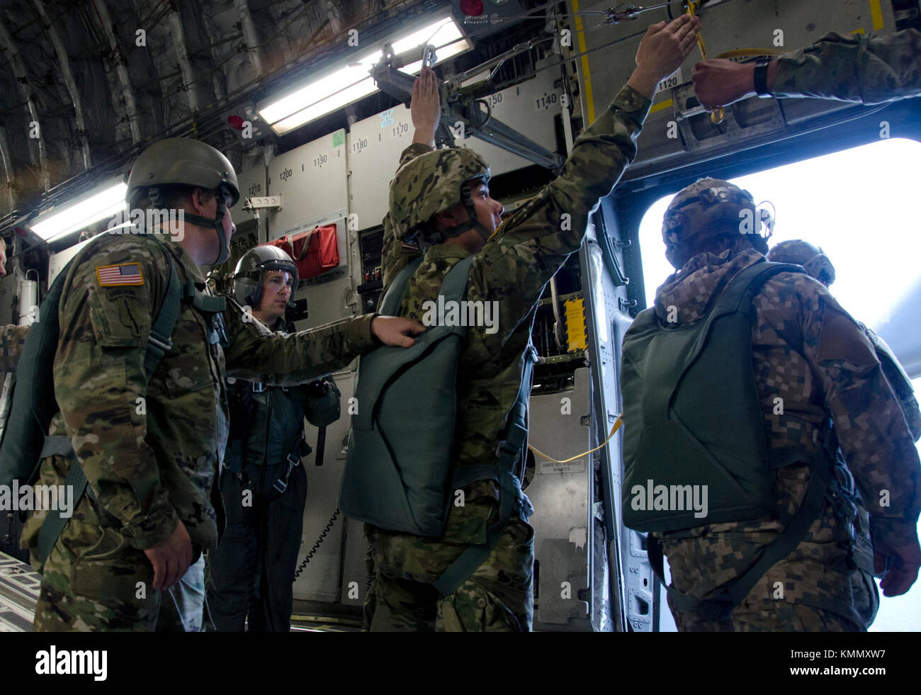 Jumpmasters position themselves before commencing a jump during ...