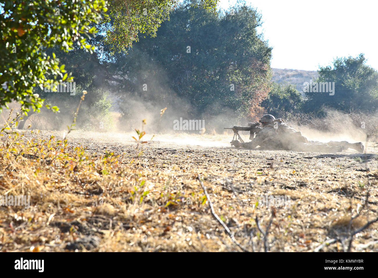 A U.S. Marine with the Infantry Unit Leaders Course fires at his target ...
