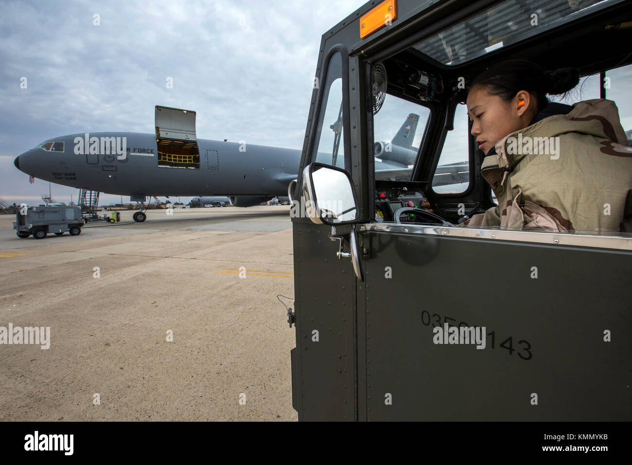 U.S. Air Force Senior Airman Vince Tsang, an Aerial Porter with the ...