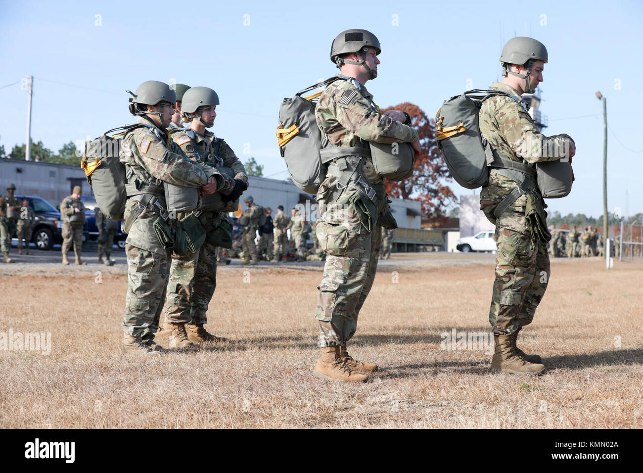 U.S. Army Paratroopers walk toward the UH-60 Blackhawk for the 20th ...