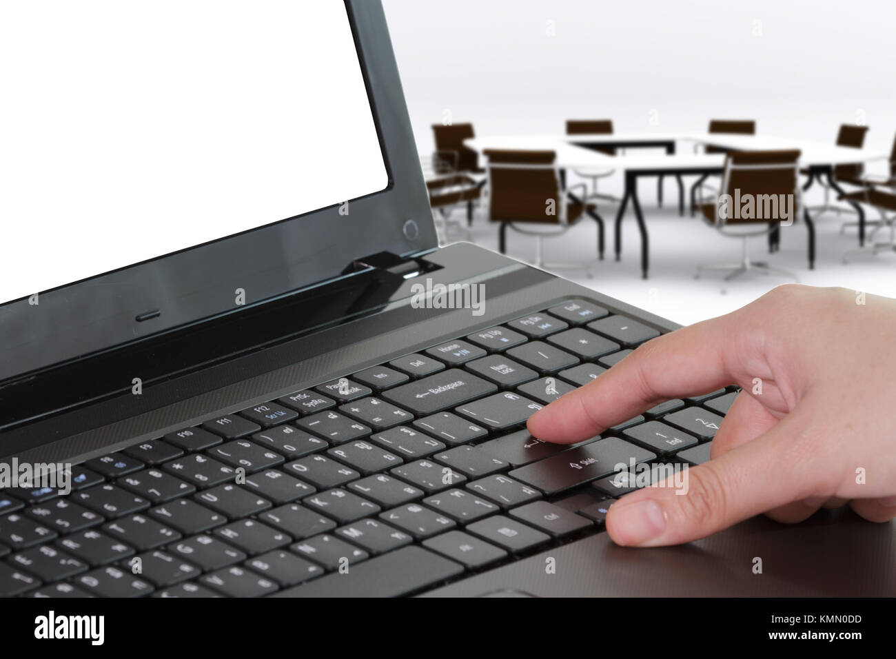businessman hands typing on a laptop with meeting room background Stock ...