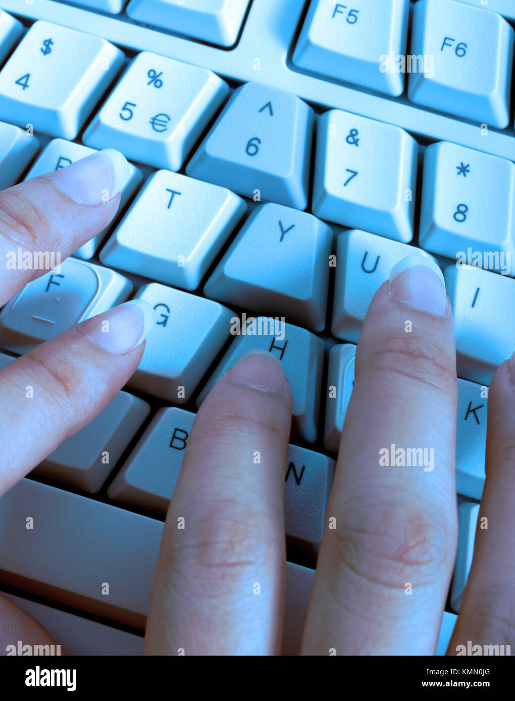 Working Hard Typing On The Computer Stock Photo - Alamy