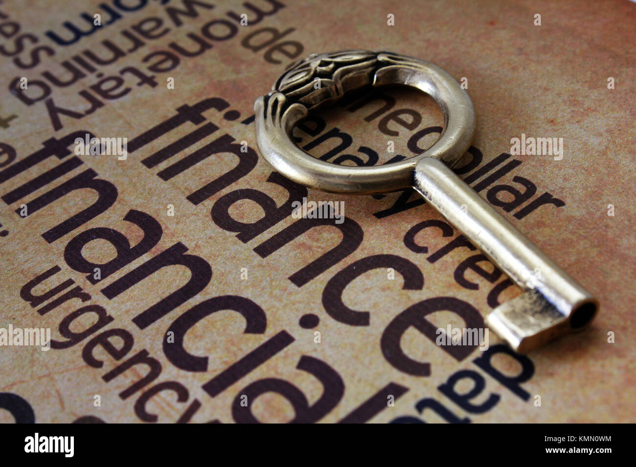 Golden key and finance concept Stock Photo - Alamy