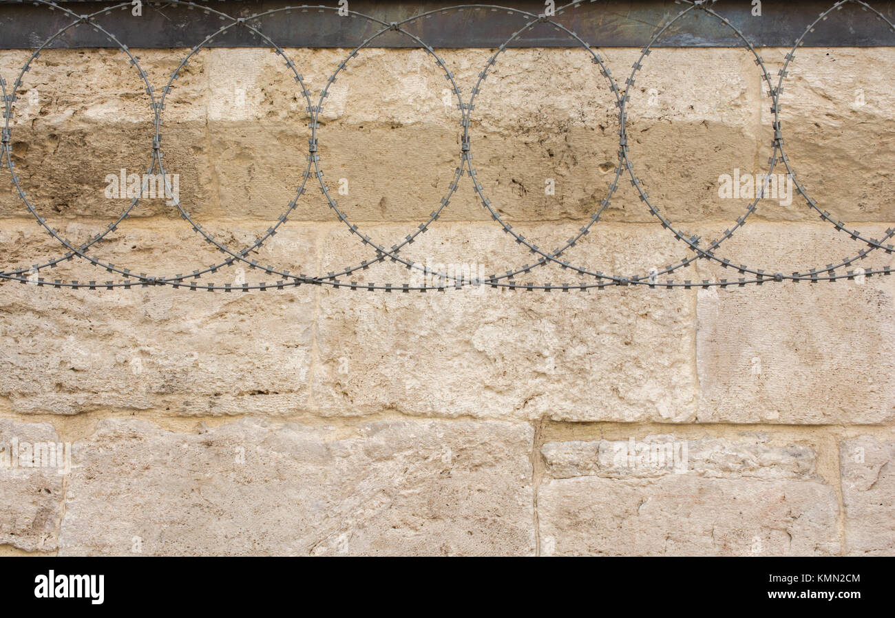 barbed wire fence used for protection purposes Stock Photo - Alamy