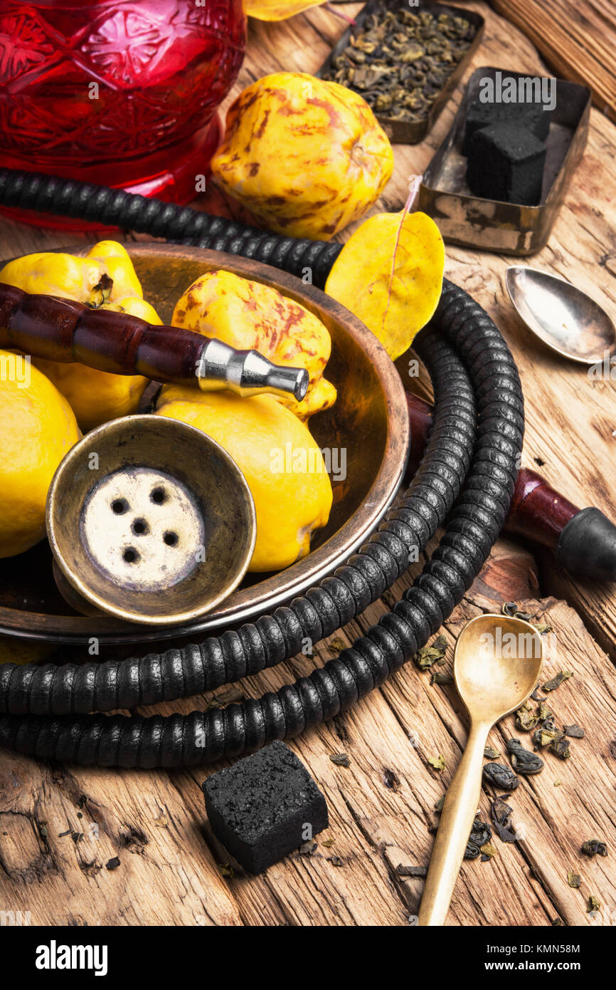 smoking hookah in Arabic style with the tobacco aroma quince Stock ...