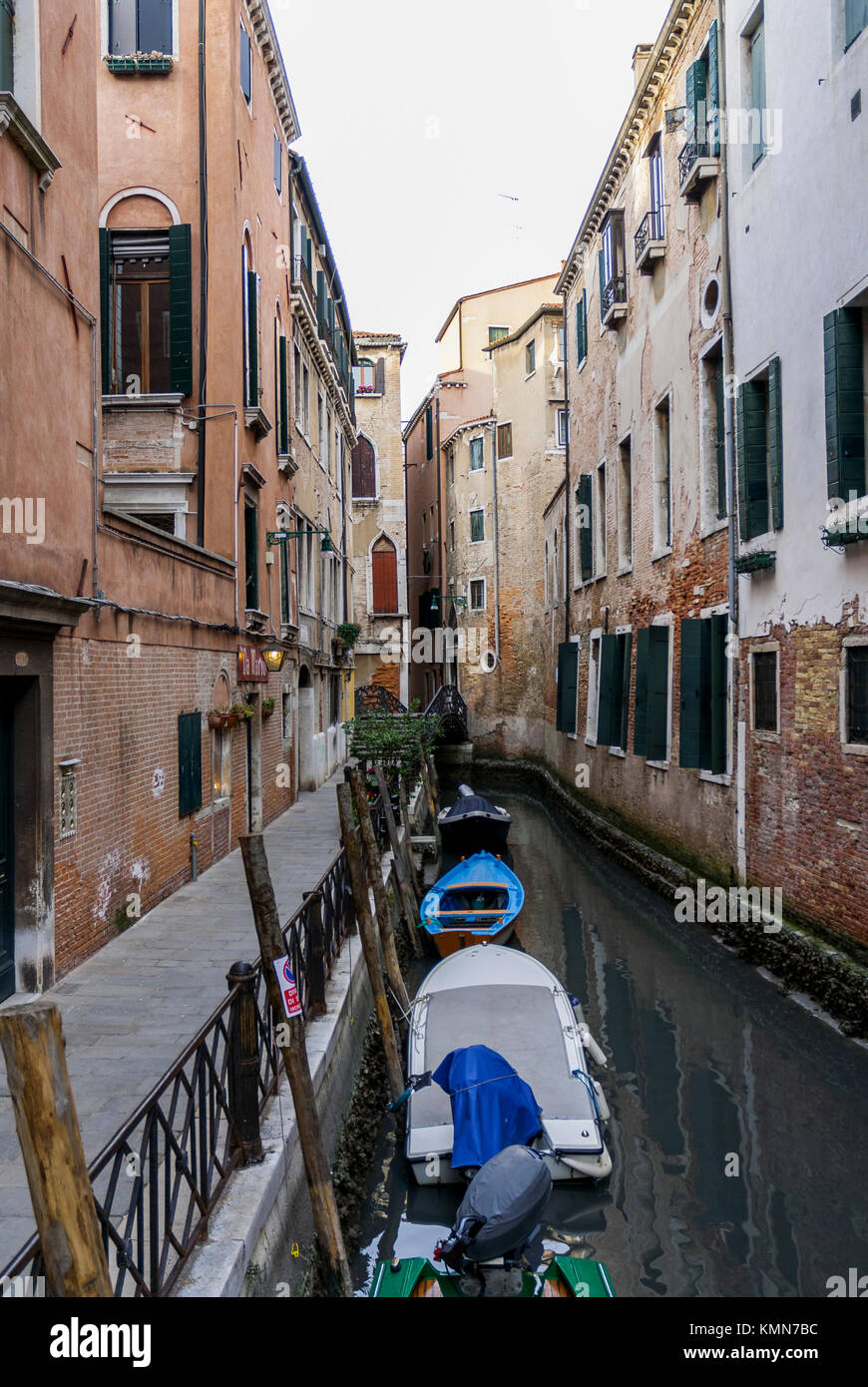 VENICE-MARCH 8 : view of a typical Venice street (calle),with canal and ...