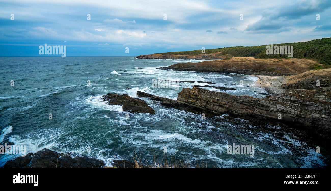 clowdy rocky seascape Stock Photo - Alamy