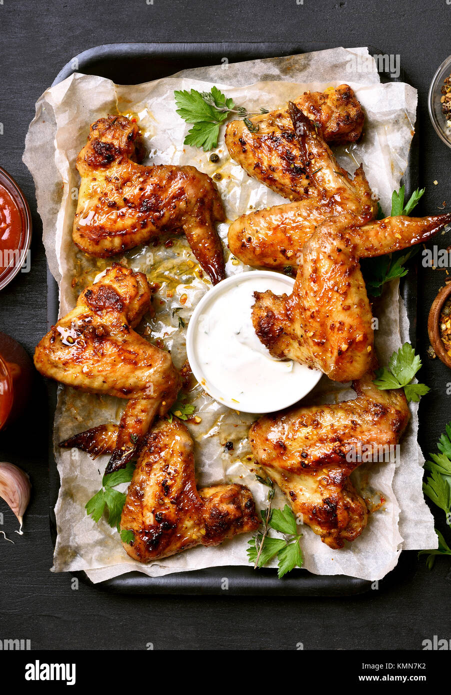 Grilled chicken wings with white sauce. Top view, flat lay Stock Photo ...