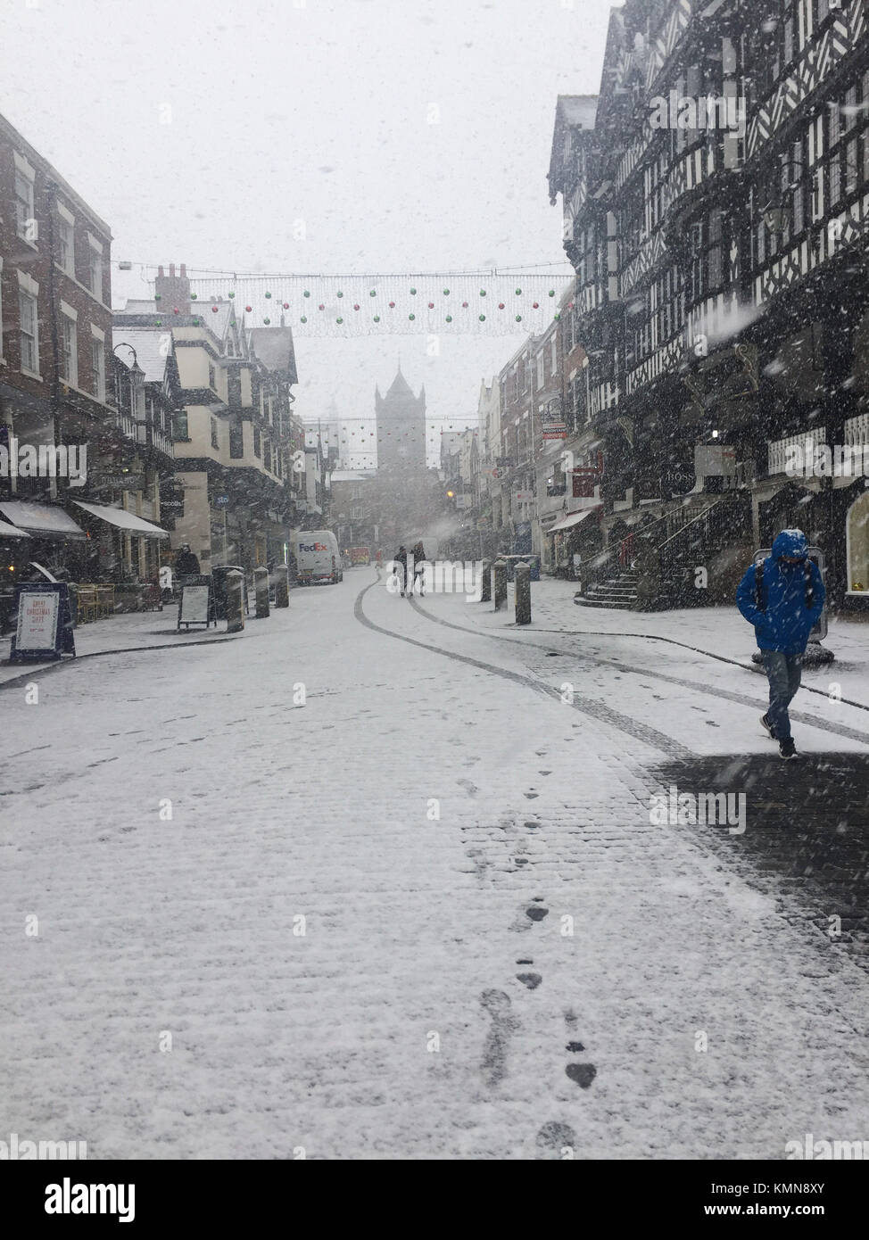 Snow falls in Chester, as parts of Britain woke up to a blanket of snow ...