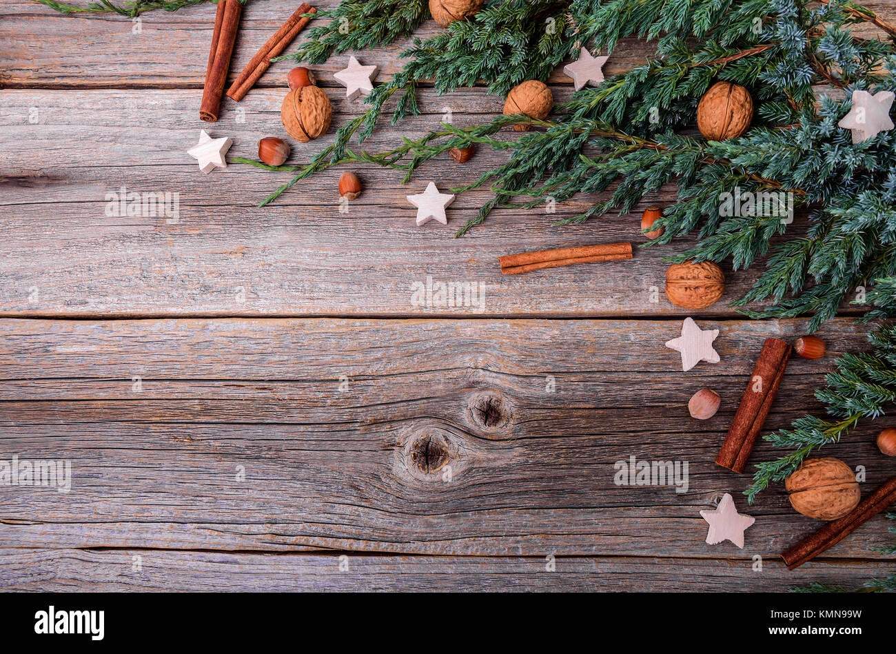 Christmas tree and nuts on wooden boards Stock Photo - Alamy
