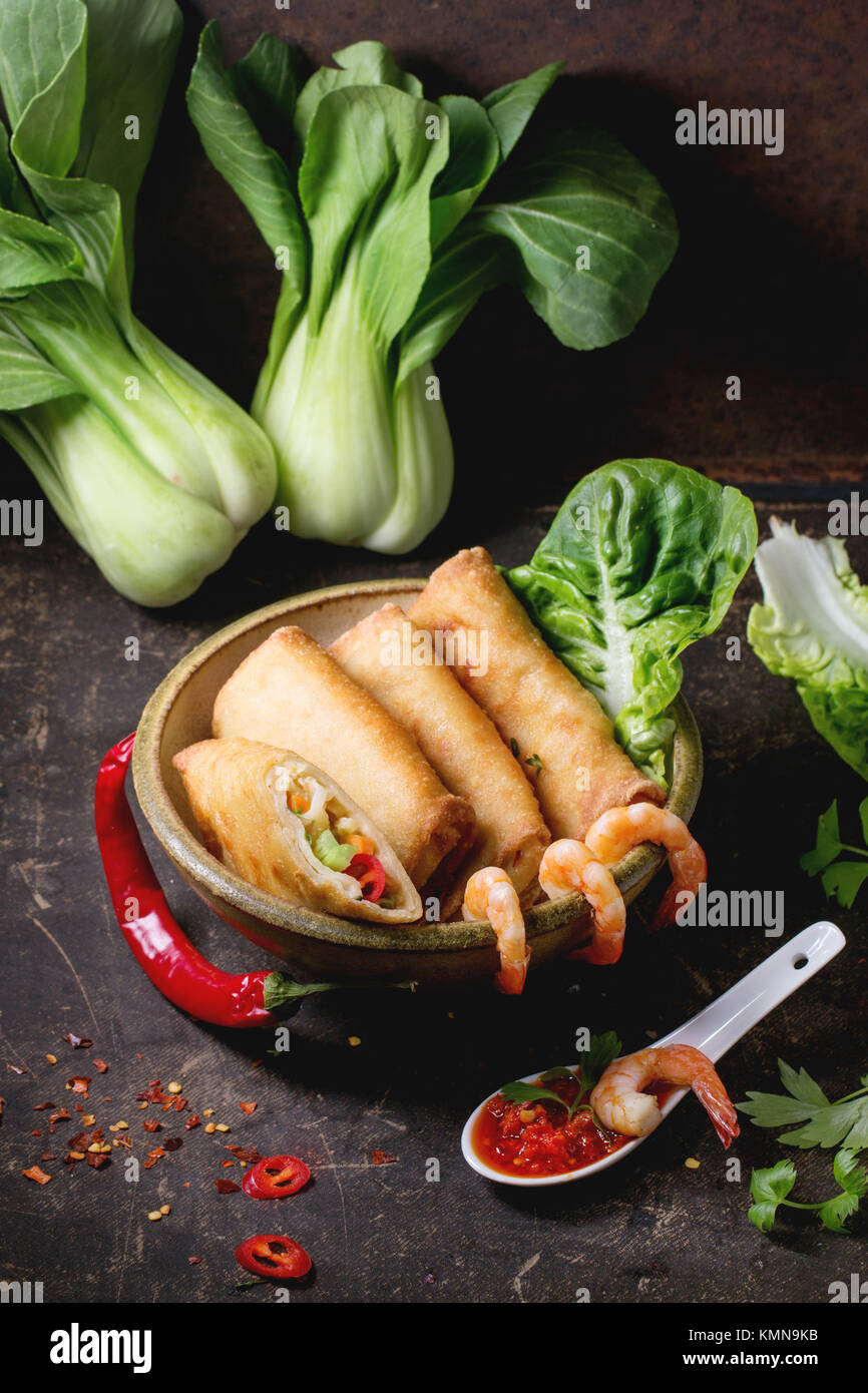 Fried spring rolls with vegetables and shrimps, served in ceramic bowl ...
