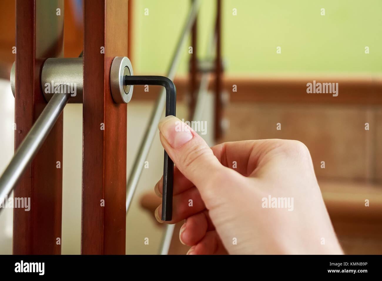 Assembling furniture with hex key Stock Photo - Alamy