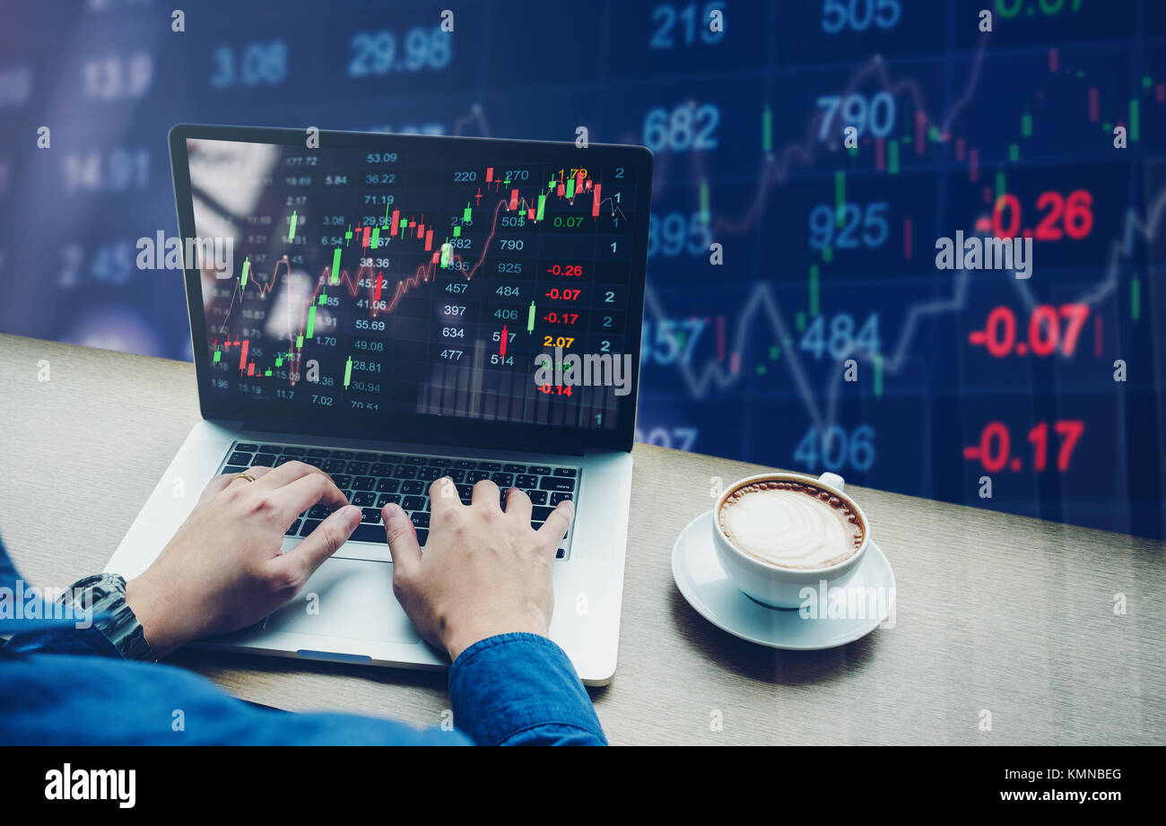 Business man working Laptop Stock market exchange information and ...