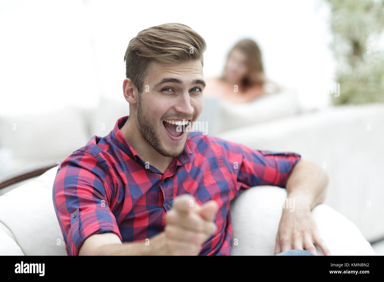 closeup of happy young man showing forward Stock Photo - Alamy