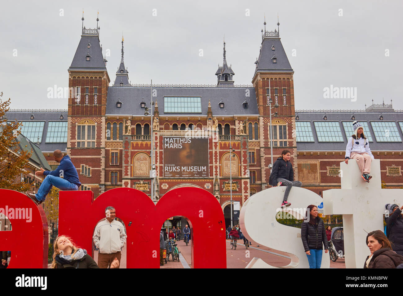 Tourists and the I Amsterdam giant letters marketing slogan with ...