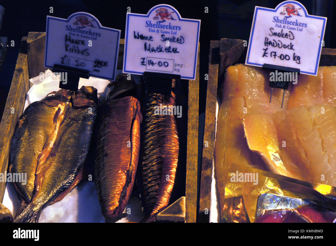fresh smoked haddock, kippers and mackerel for sale at a fishmongers ...