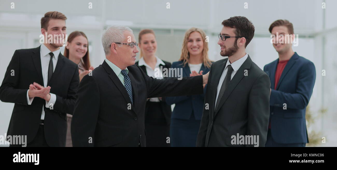 The team of the successful people with their boss Stock Photo - Alamy