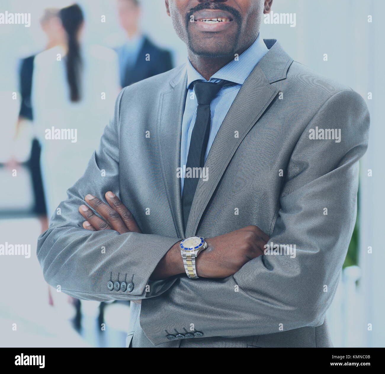 Portrait of a successful american african businessman smiling leading ...