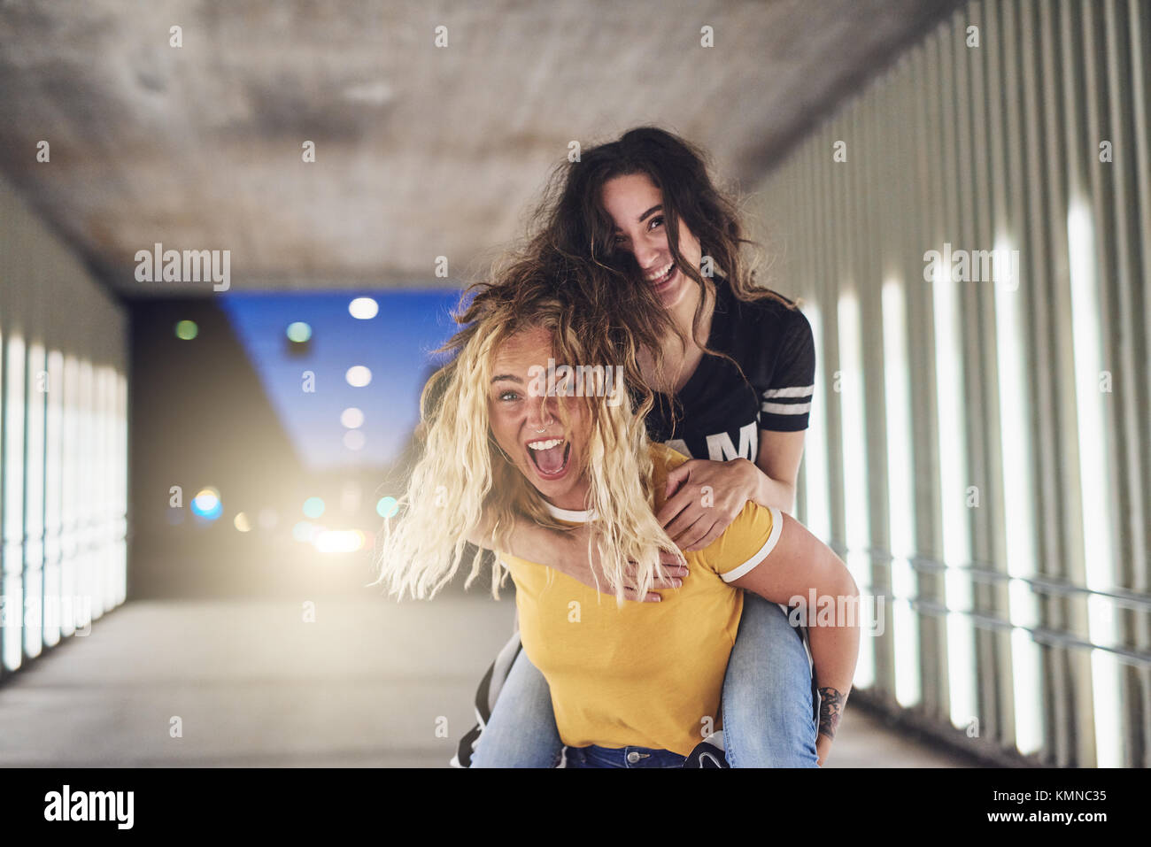 Carrying a friend on shoulders hi-res stock photography and images - Alamy