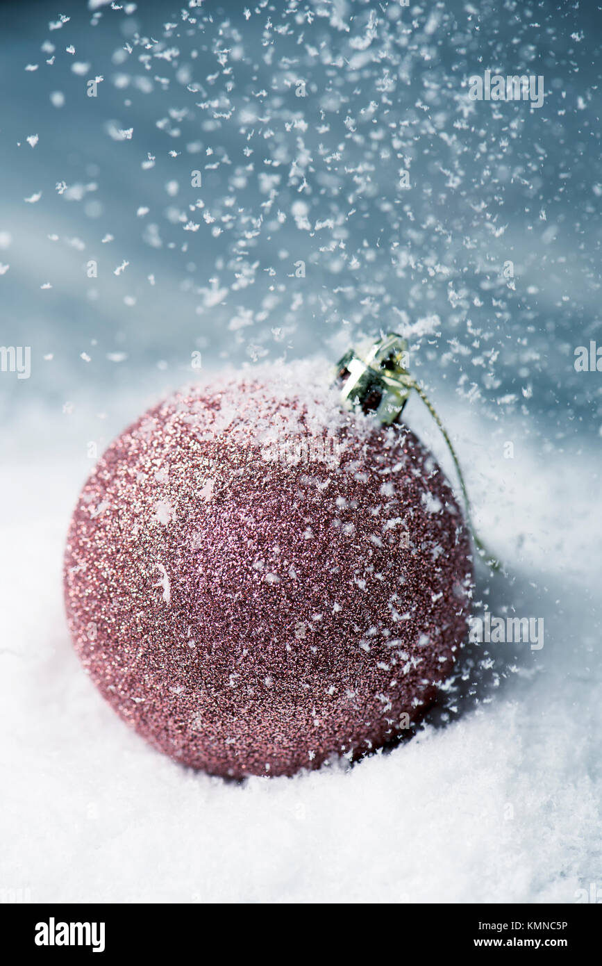 closeup of an elegant christmas ball on the snow Stock Photo - Alamy