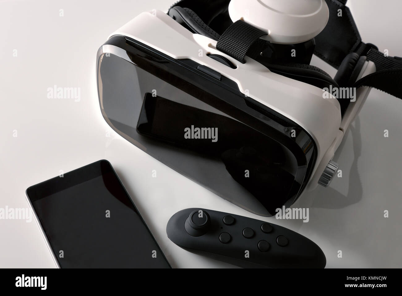 Black and white virtual reality glasses close up with smartphone on ...