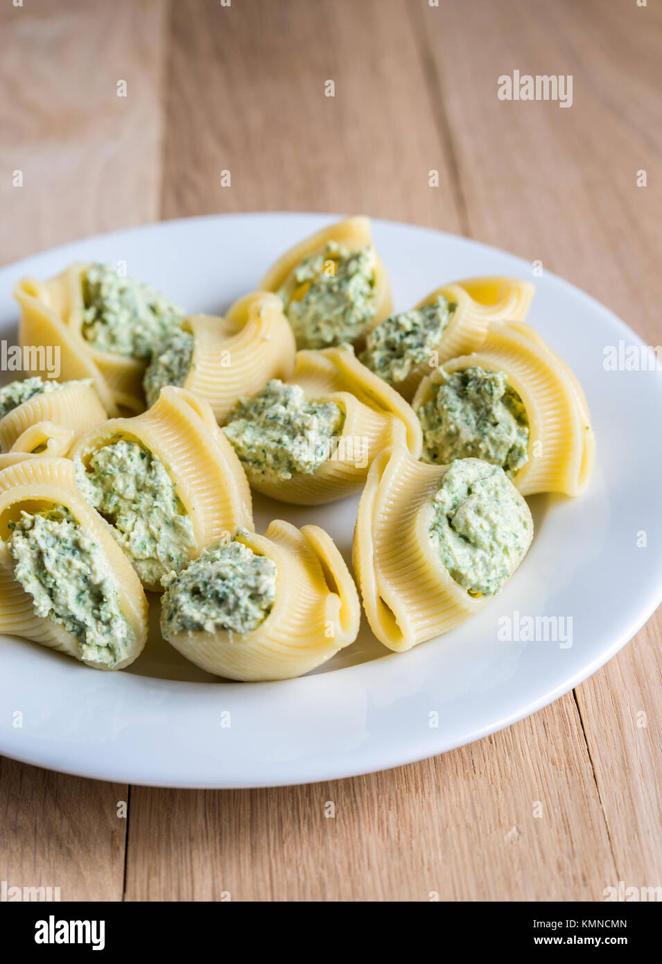 Stuffed lumaconi with cheese Stock Photo - Alamy