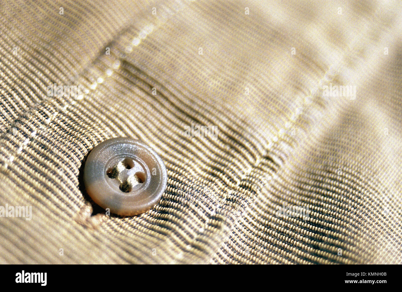 Close-up of button on shirt Stock Photo - Alamy