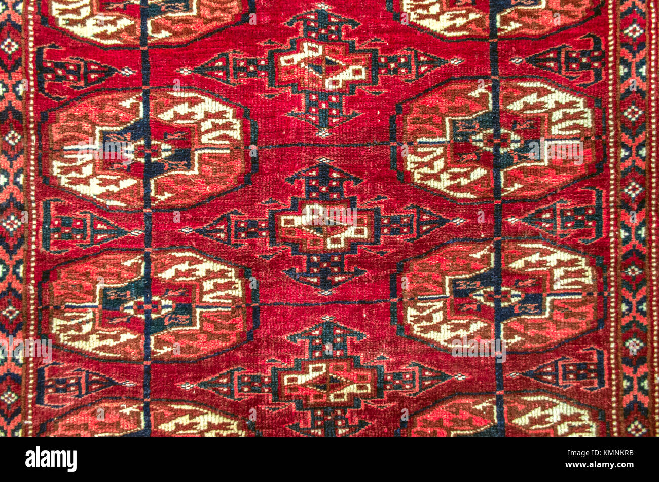 Detail of central part of national patterns of the Turkmen carpet woven ...