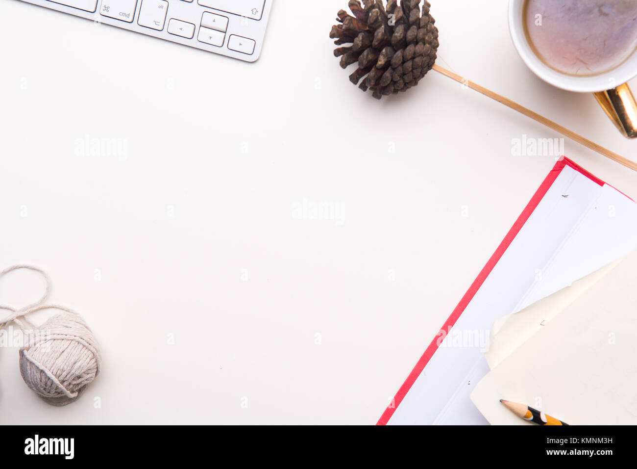 Creative workspace in home office with pen, paper and keyboard ...