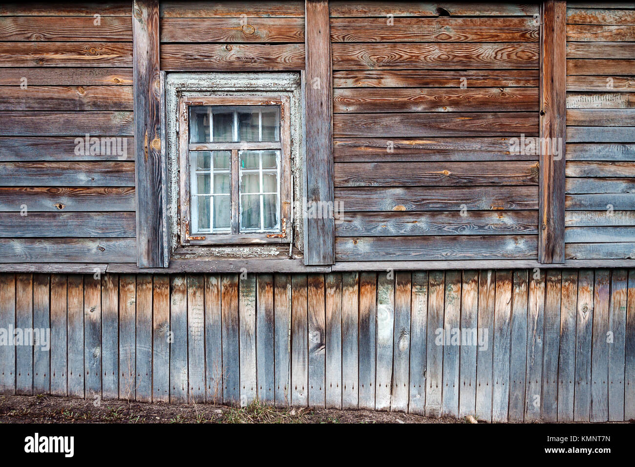 Old window on a aged wooden wall. Architectural detail. Architecture ...