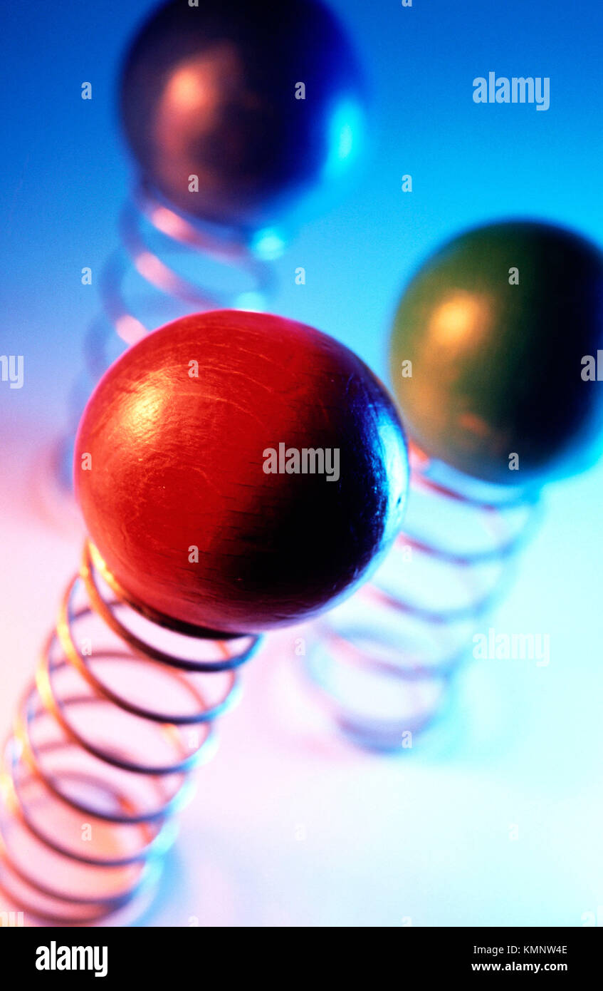 Balls on springs Stock Photo - Alamy